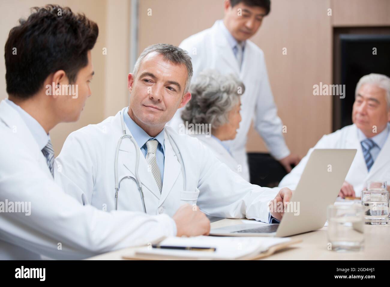 Medical experts holding a meeting Stock Photo - Alamy