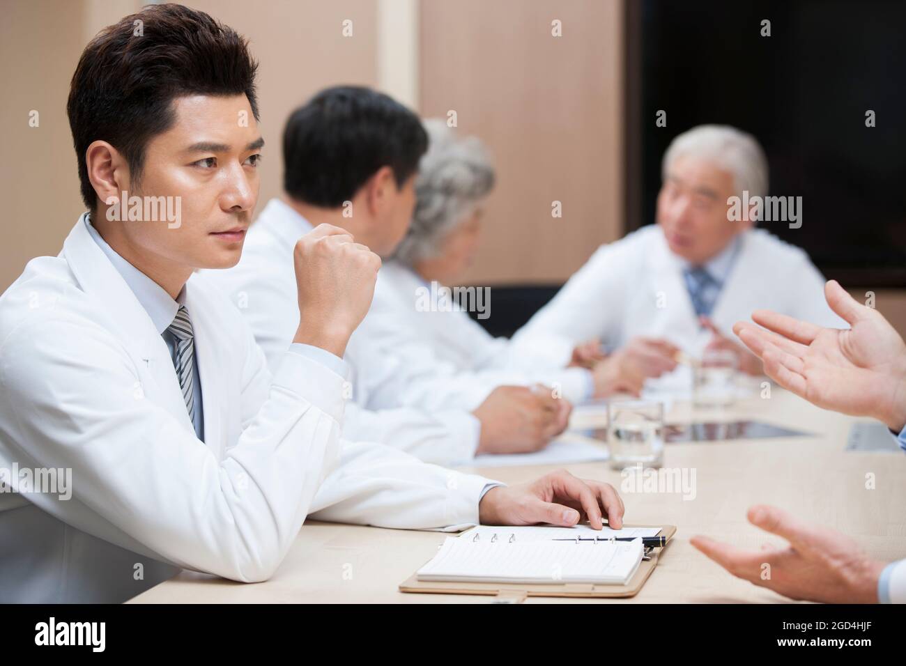 Medical experts holding a meeting Stock Photo - Alamy