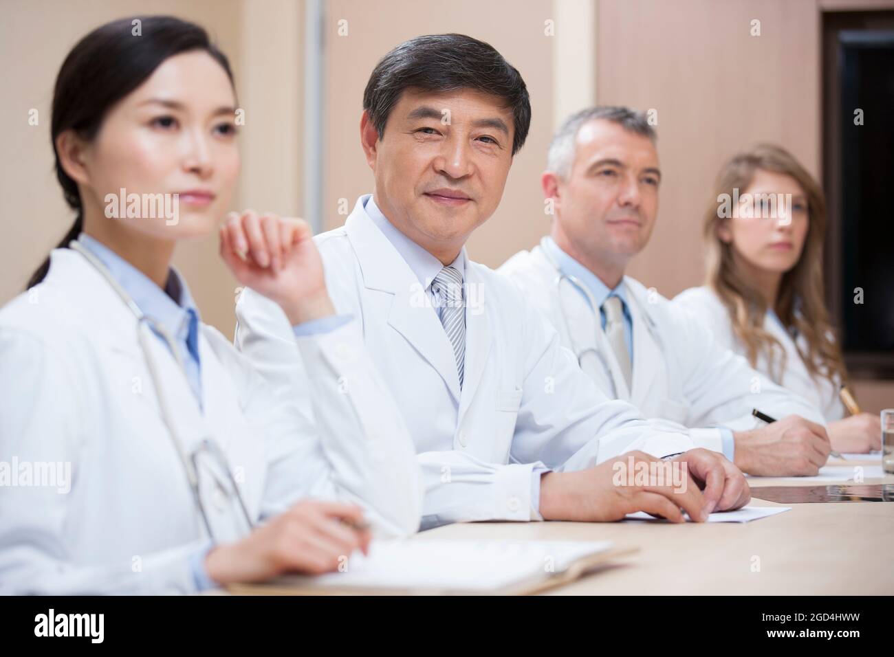 Medical experts holding a meeting Stock Photo - Alamy