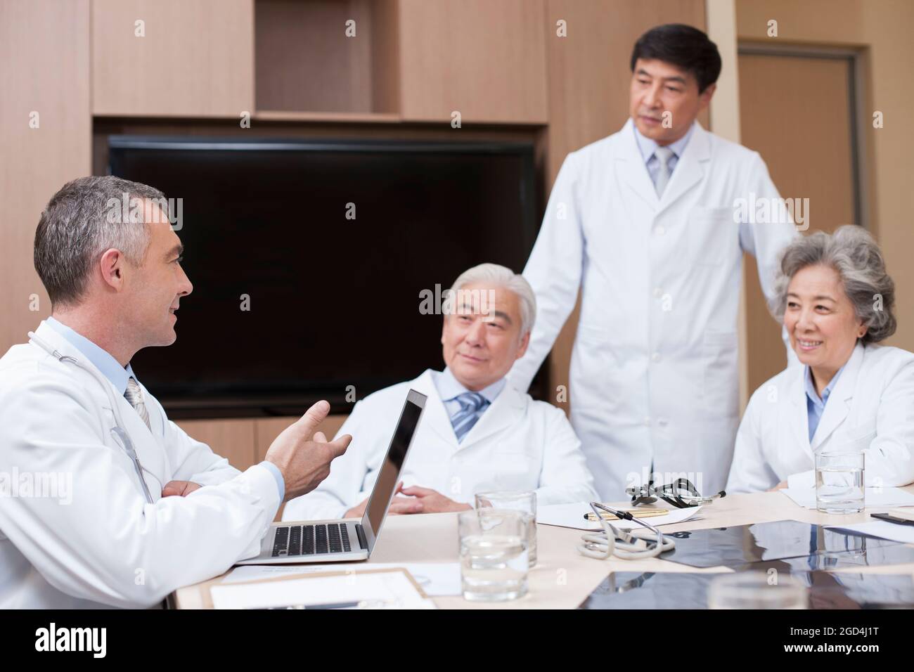 Medical experts holding a meeting Stock Photo - Alamy