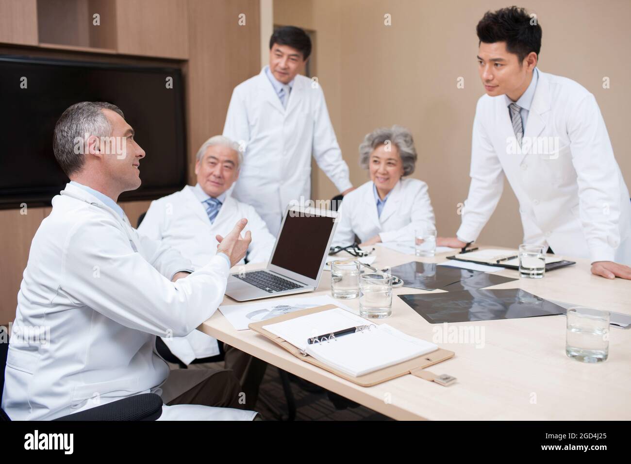 Medical experts holding a meeting Stock Photo - Alamy