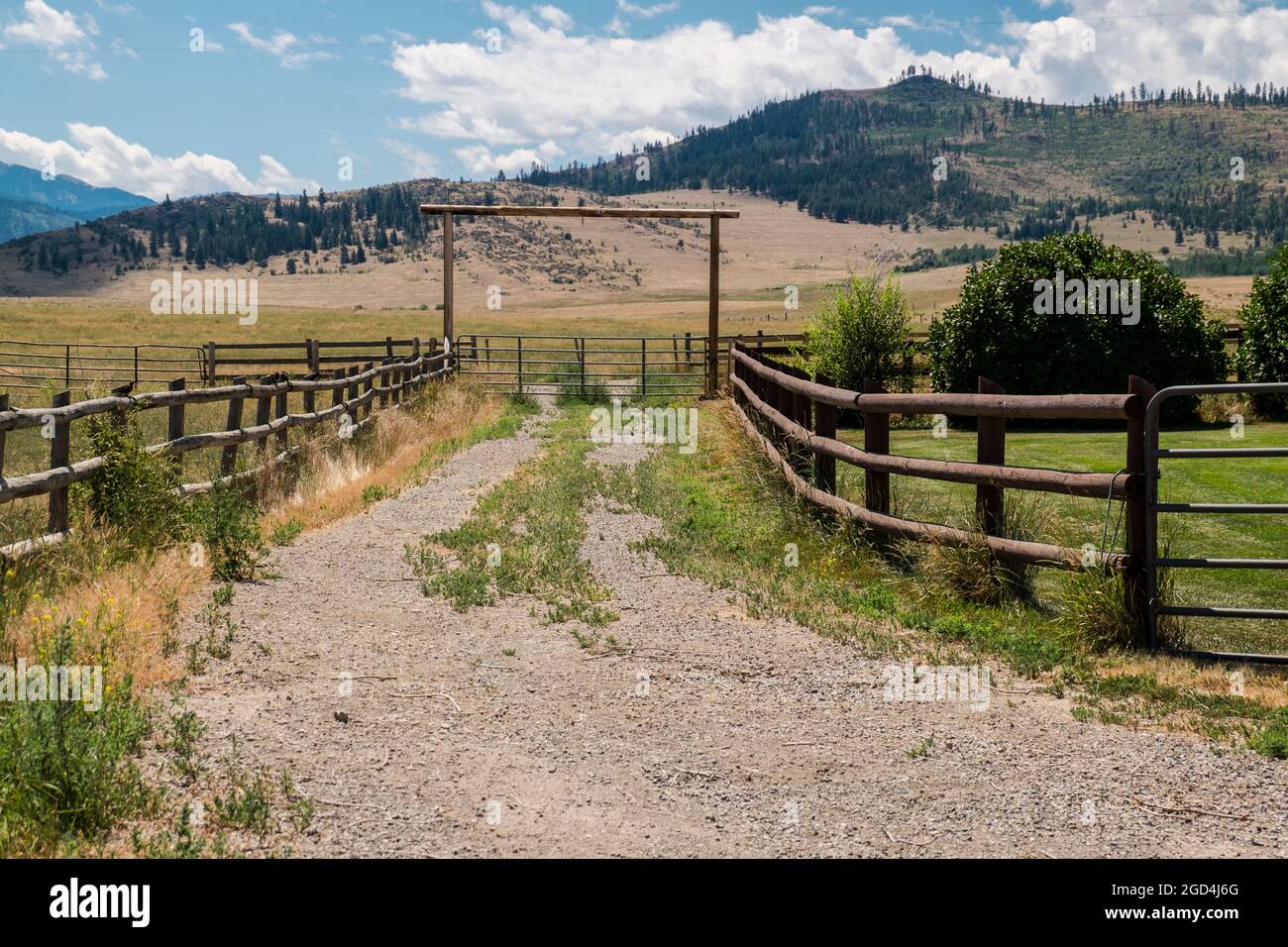 Ranch mountain pasture gate fence hi-res stock photography and images ...