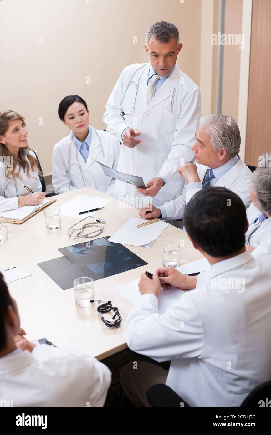 Medical experts holding a meeting Stock Photo - Alamy