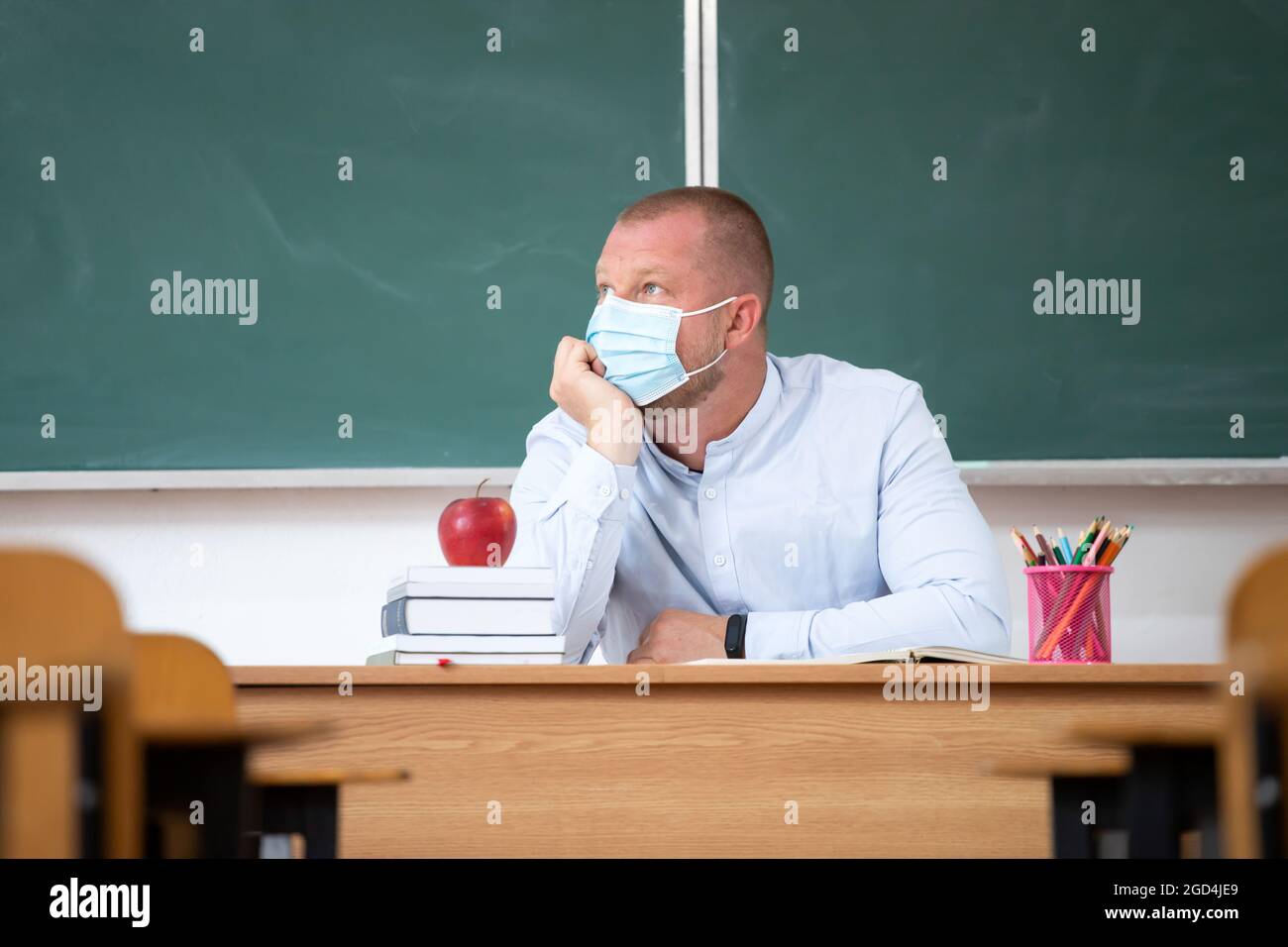 Sad teacher hi-res stock photography and images - Alamy