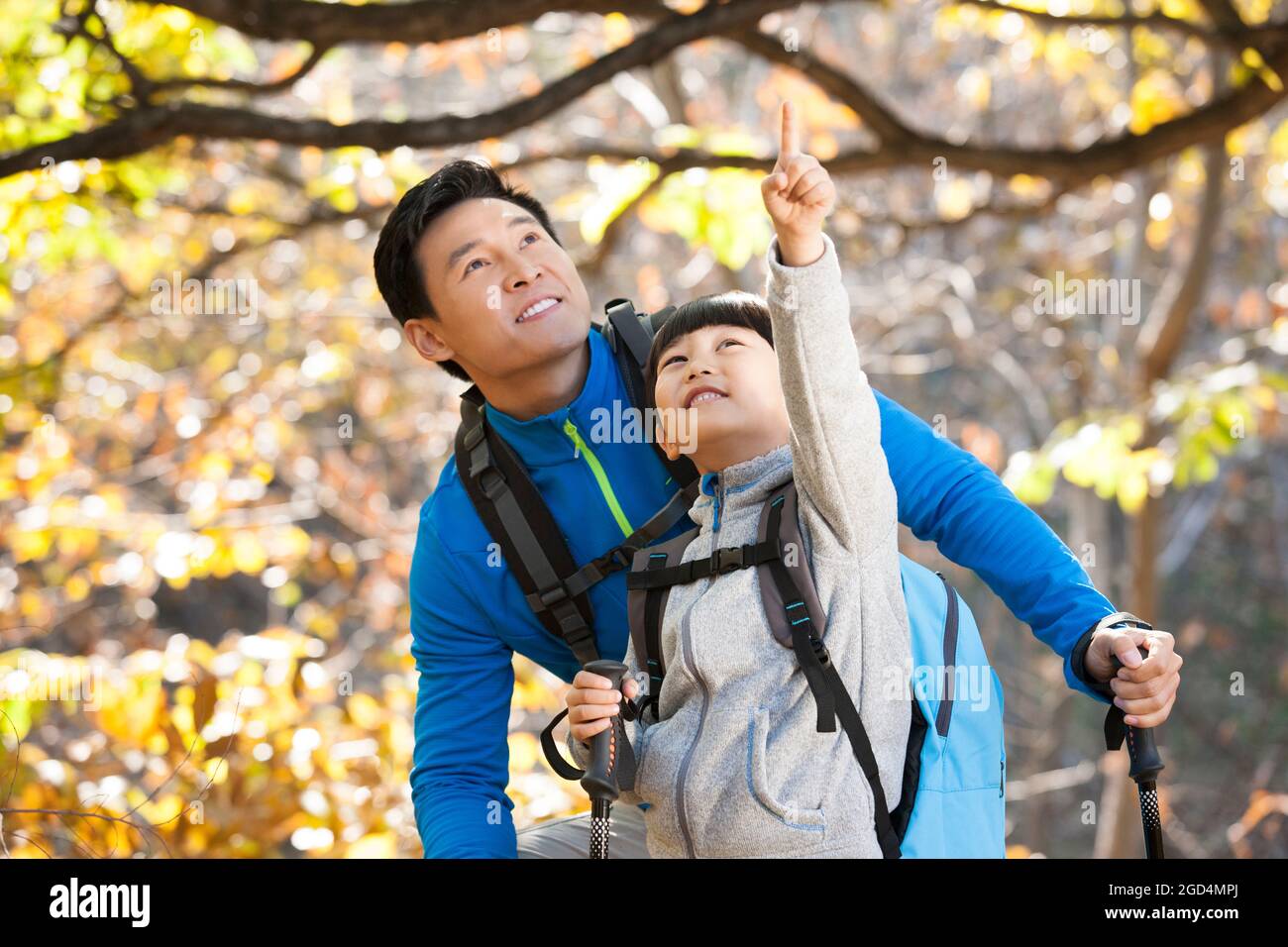 Indian father son back back hi-res stock photography and images - Alamy