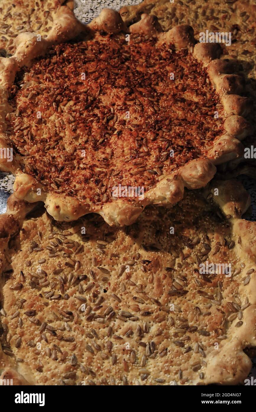 Pieces of nang-naan bread: oven baked-unleavened-flatbread-nuts inlaid ...