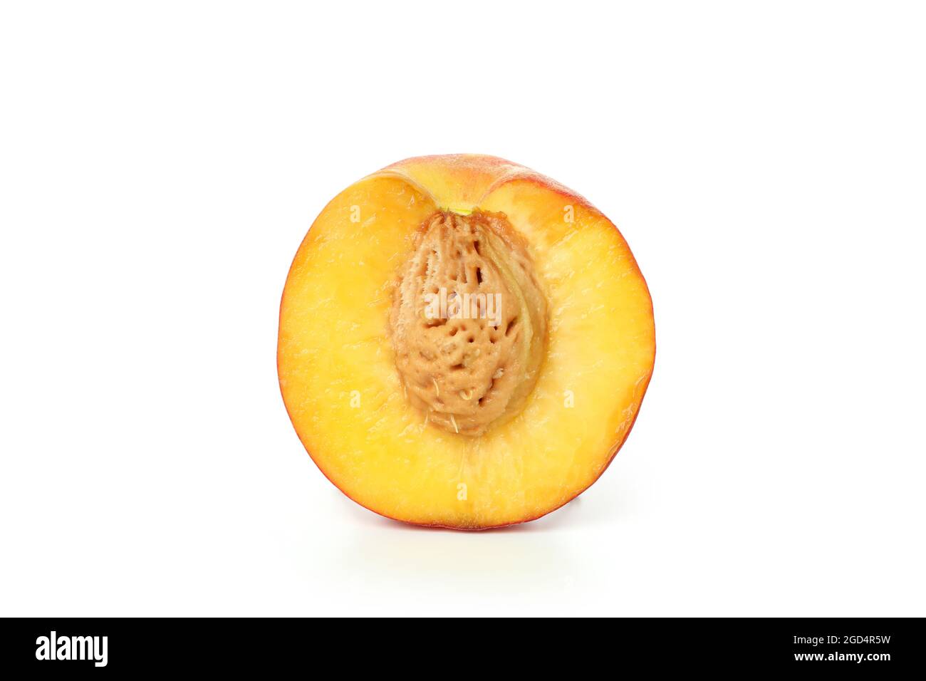 Half of peach fruit isolated on white background Stock Photo - Alamy