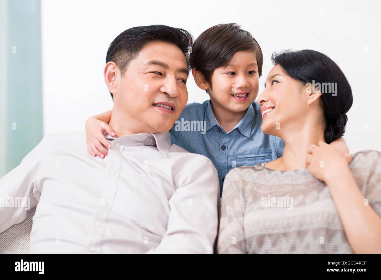 Cheerful grandparents grandson home hi-res stock photography and images ...