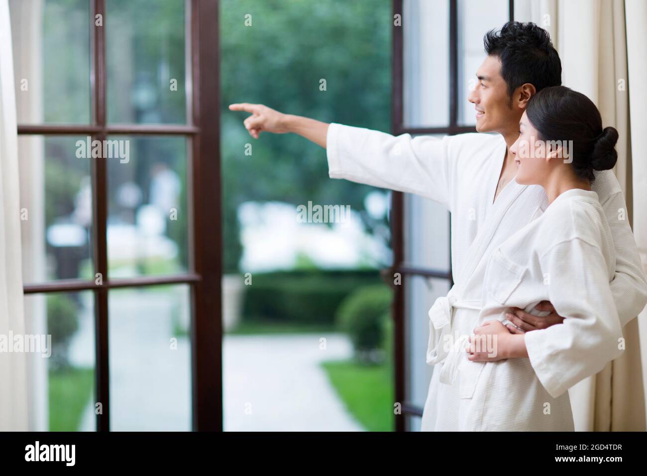 Loving couple with arm around each other Stock Photo - Alamy