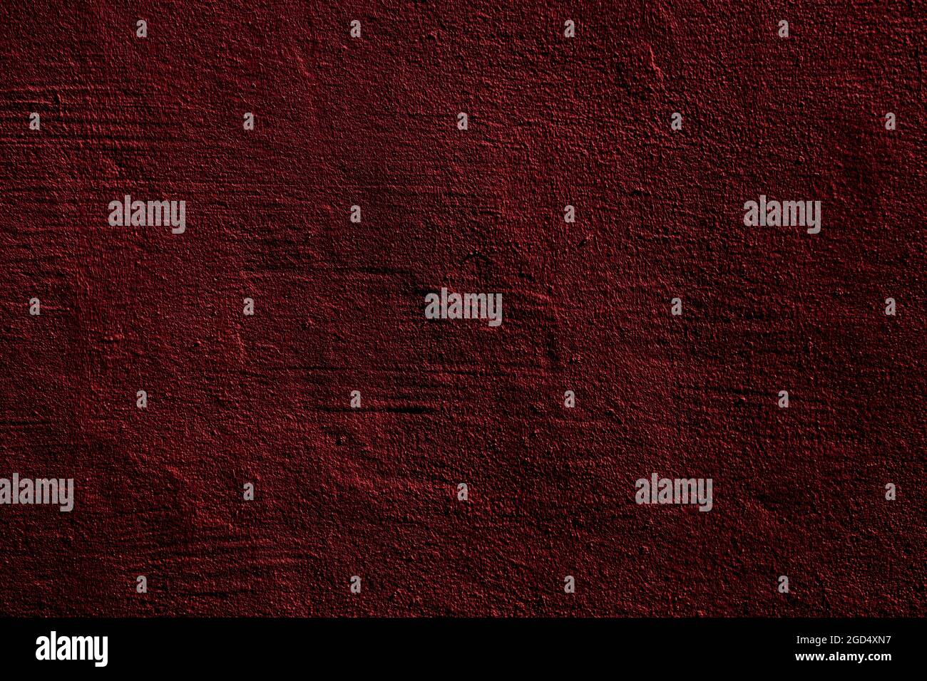 Crimson colored wall background with textures of different shades of ...