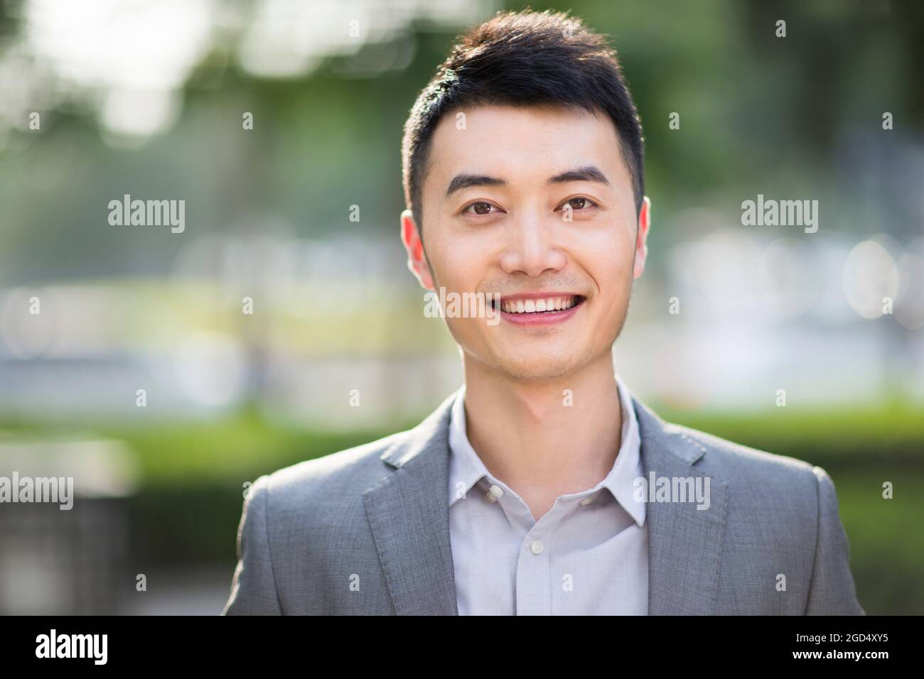 Portrait of confident businessman Stock Photo - Alamy