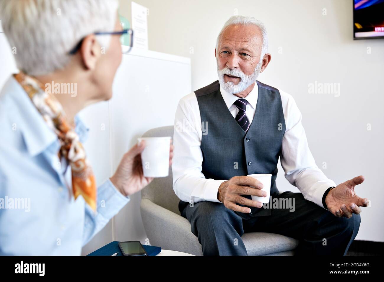 senior busniess people talking office communication Stock Photo - Alamy