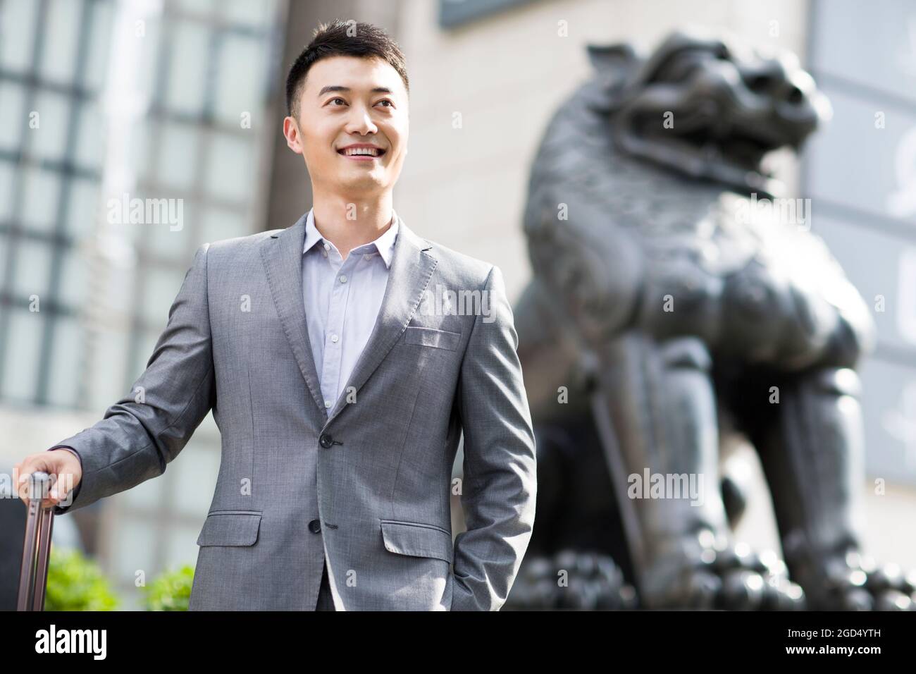 Indian man standing outside the bank hi-res stock photography and ...
