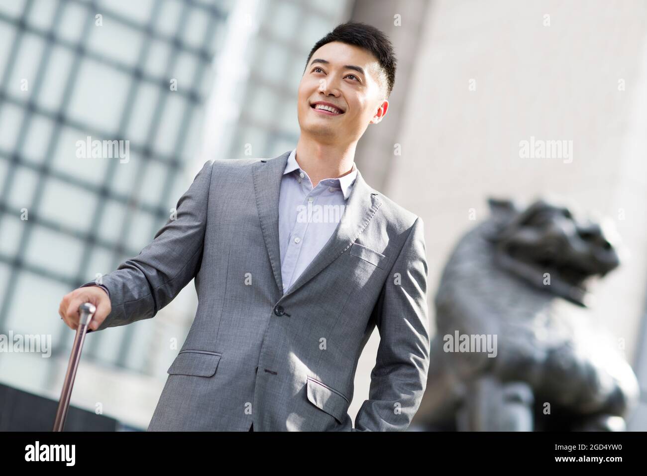 Indian man standing outside the bank hi-res stock photography and ...