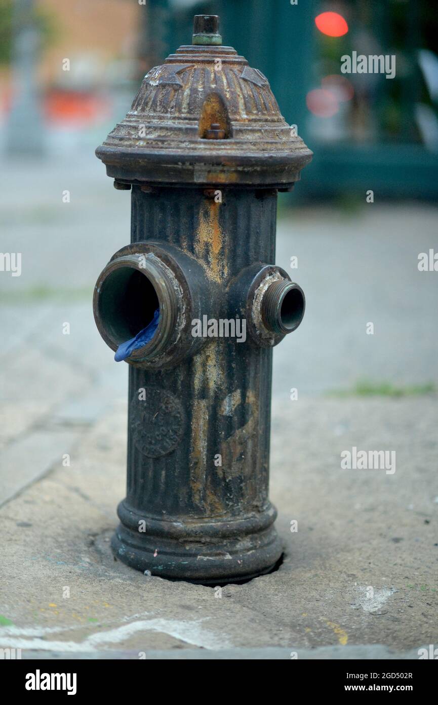 old rusty metal hydrant Stock Photo - Alamy