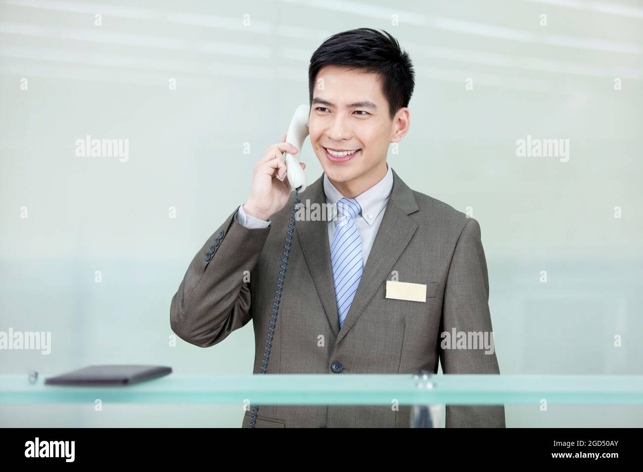 Hotel front desk phone hi-res stock photography and images - Alamy