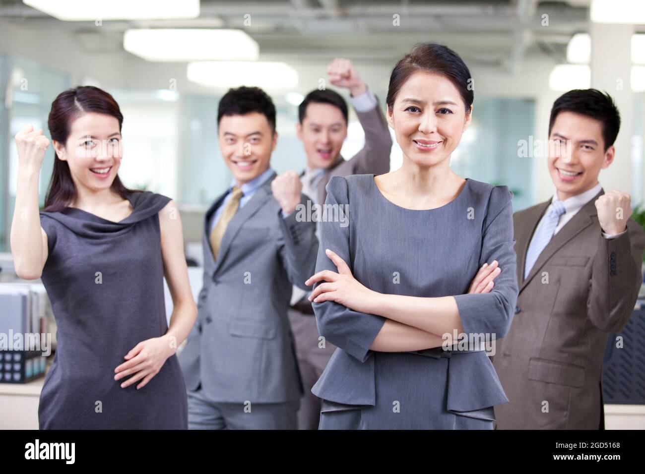 Excited business team celebrating hi-res stock photography and images ...
