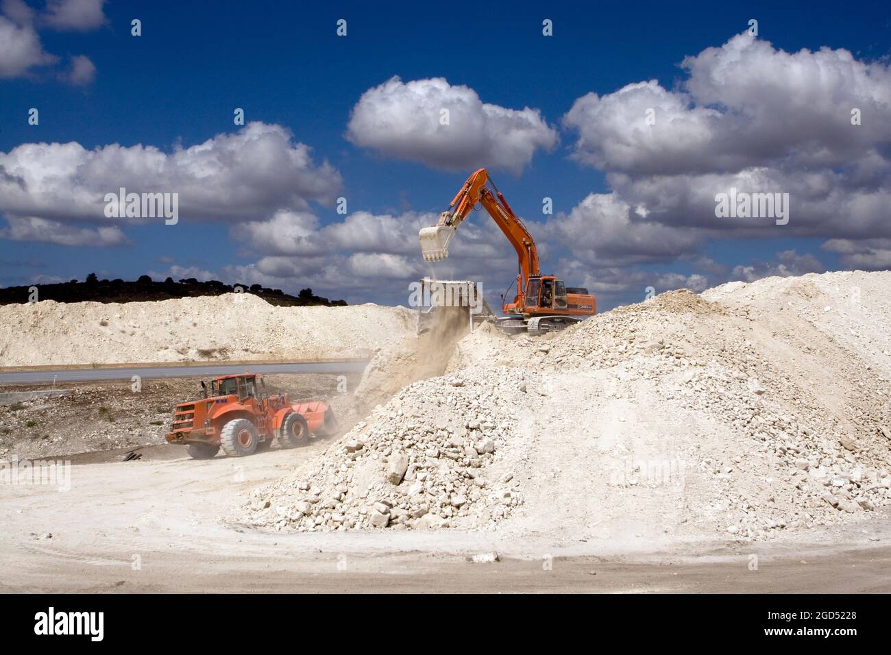 Highway construction. Earth moving equipment clearing the way for a new ...