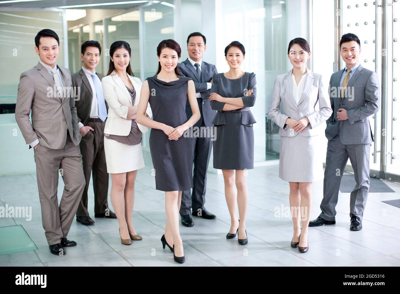 Portrait of confident business team Stock Photo - Alamy