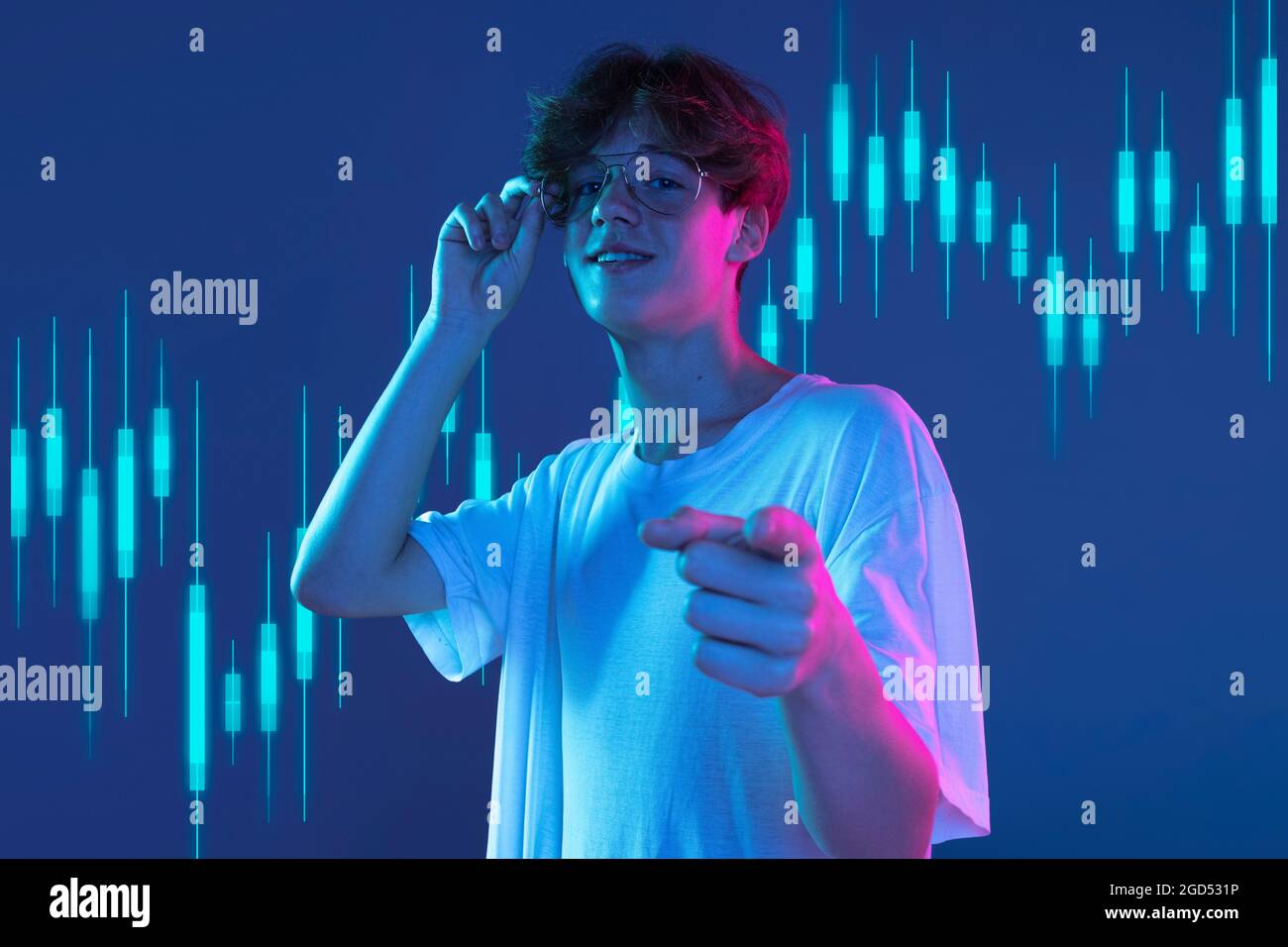 Young caucasian man, guy pointing over purple background with trading ...