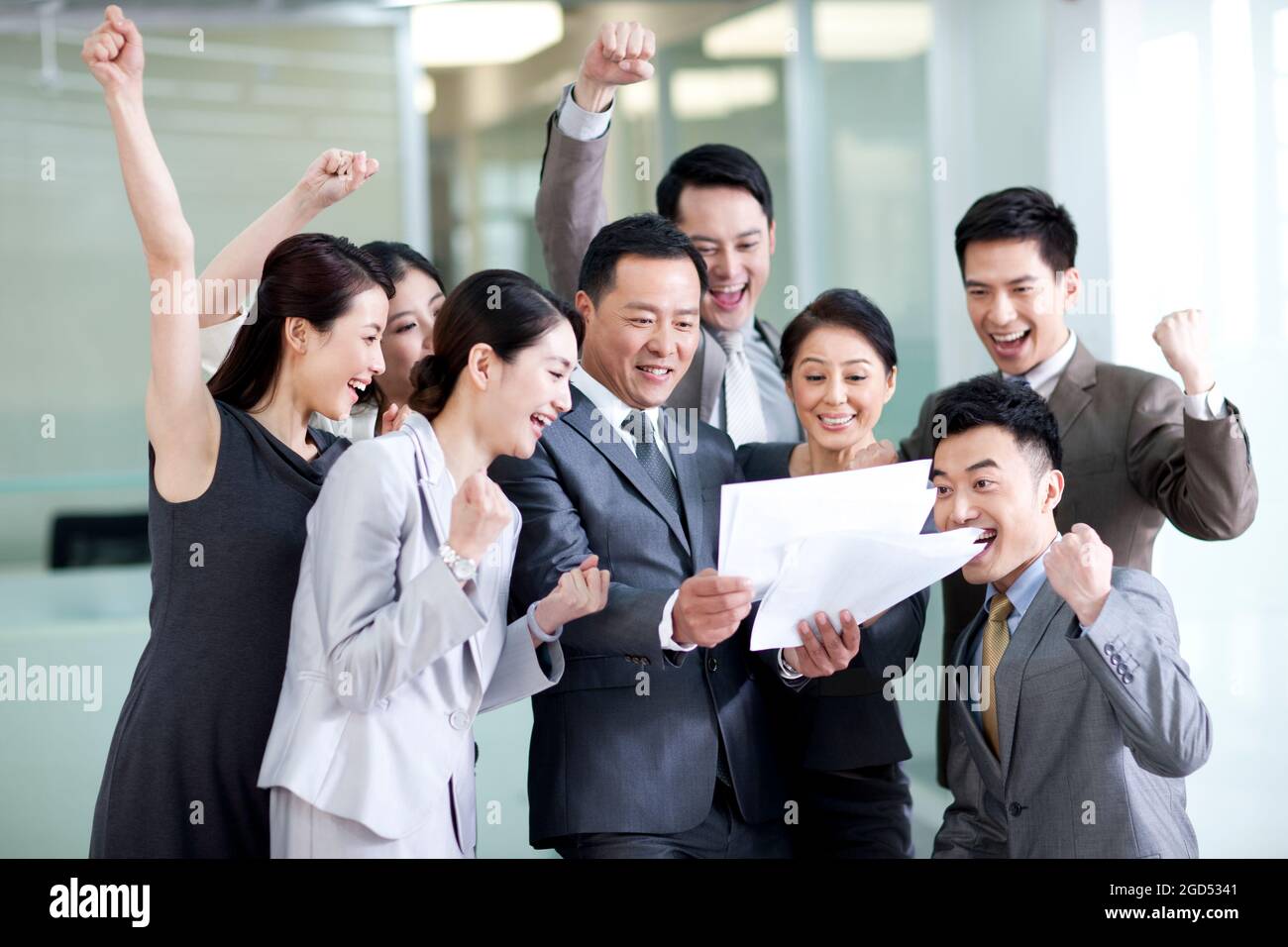 Business team celebrating with excitement Stock Photo - Alamy