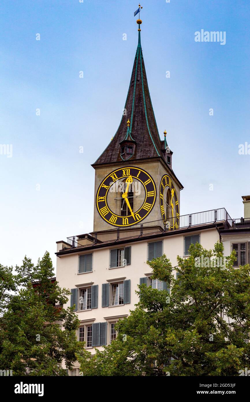 View of the old medieval clock tower in sunset lighting. Zurich ...