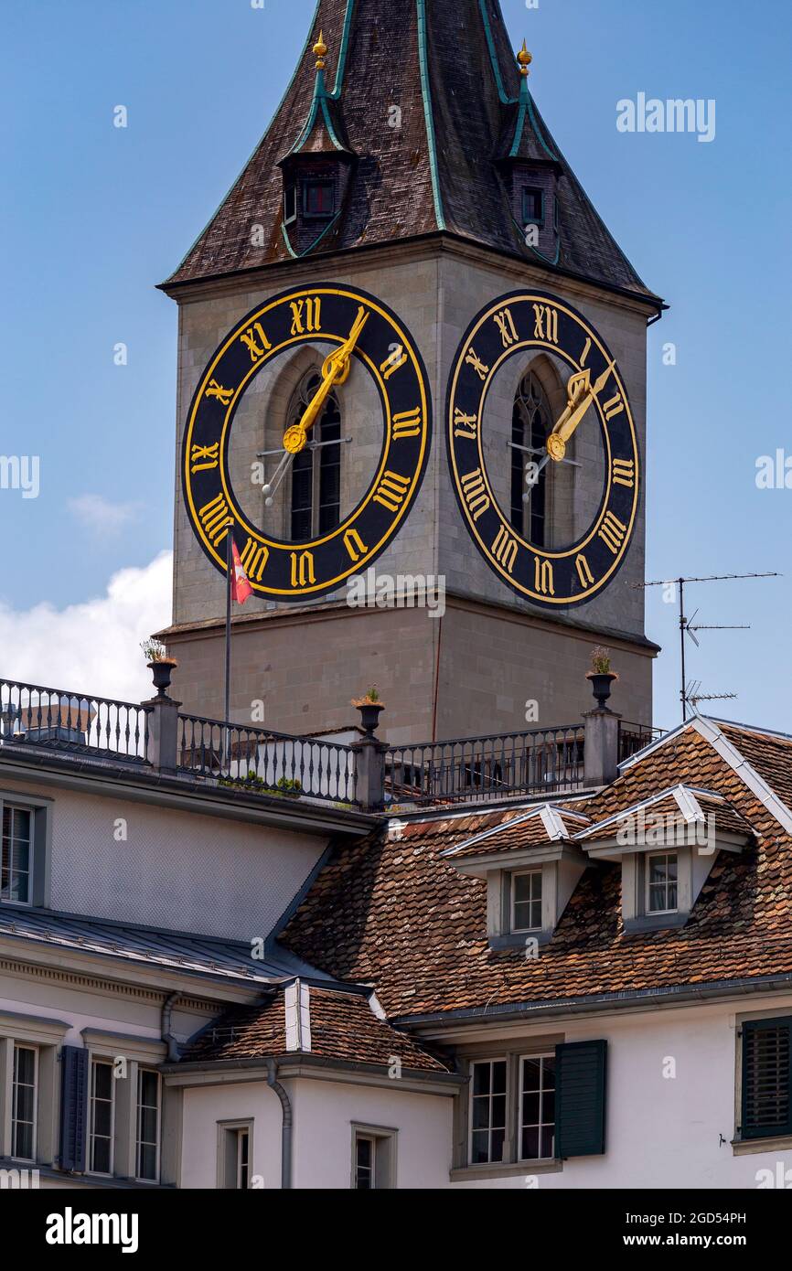 View of the old medieval clock tower in sunset lighting. Zurich ...