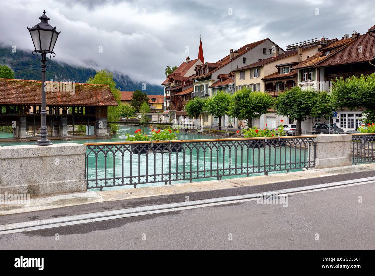 View of the old medieval wooden dam and the mill on the river Aare ...