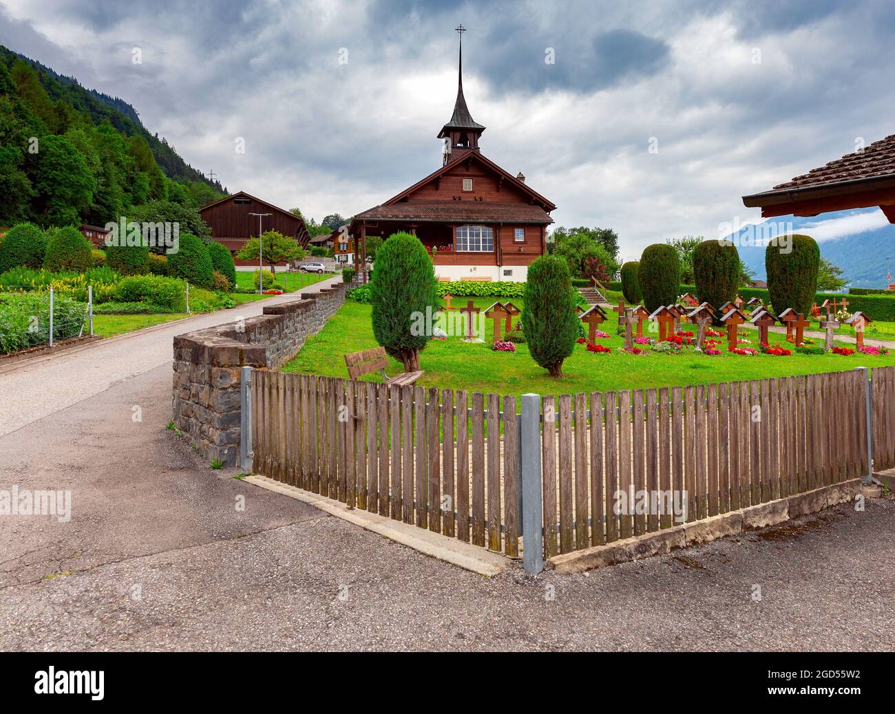 Church in the traditional Swiss village Iseltwald on the famous lake ...