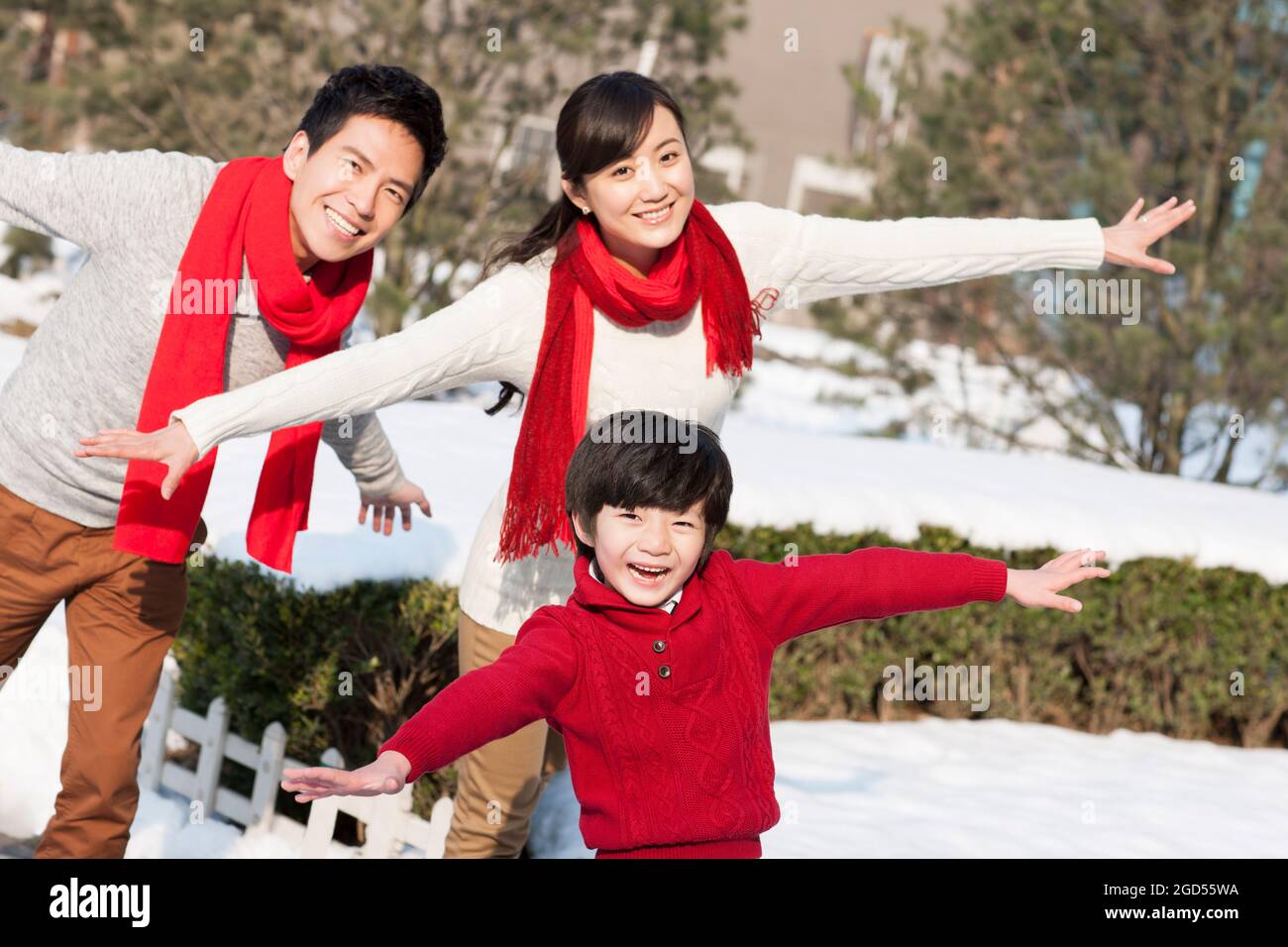 Cheerful family celebrating Chinese New Year Stock Photo - Alamy