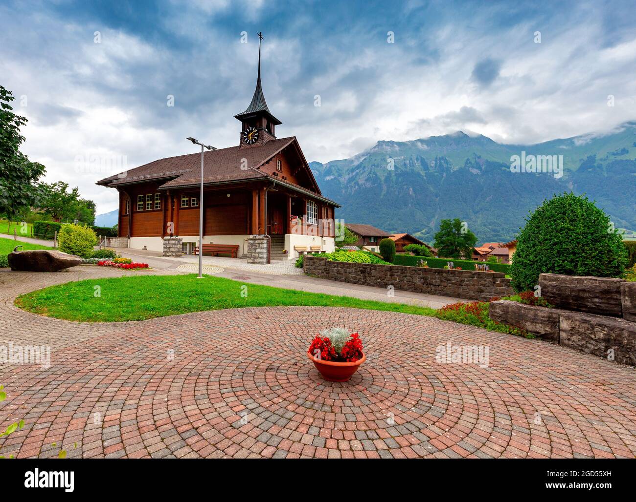 Church in the traditional Swiss village Iseltwald on the famous lake ...