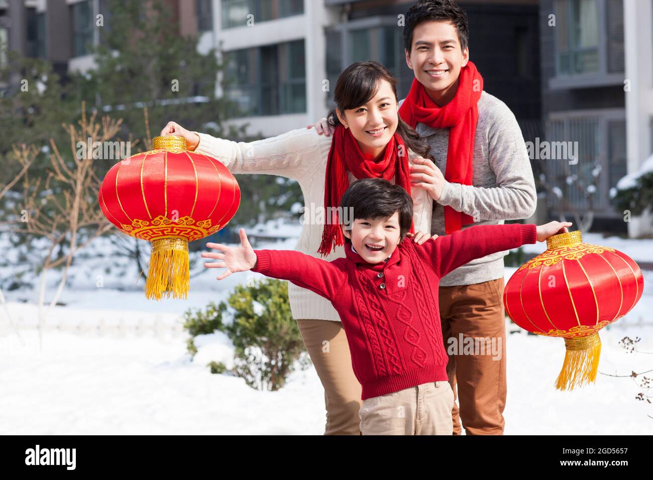 Cheerful family celebrating Chinese New Year Stock Photo - Alamy