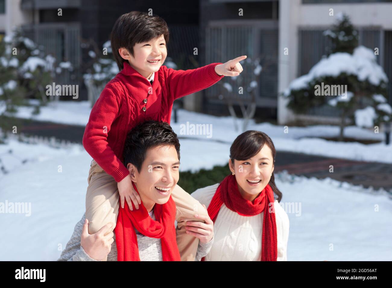 Happy family looking forward to the future Stock Photo - Alamy