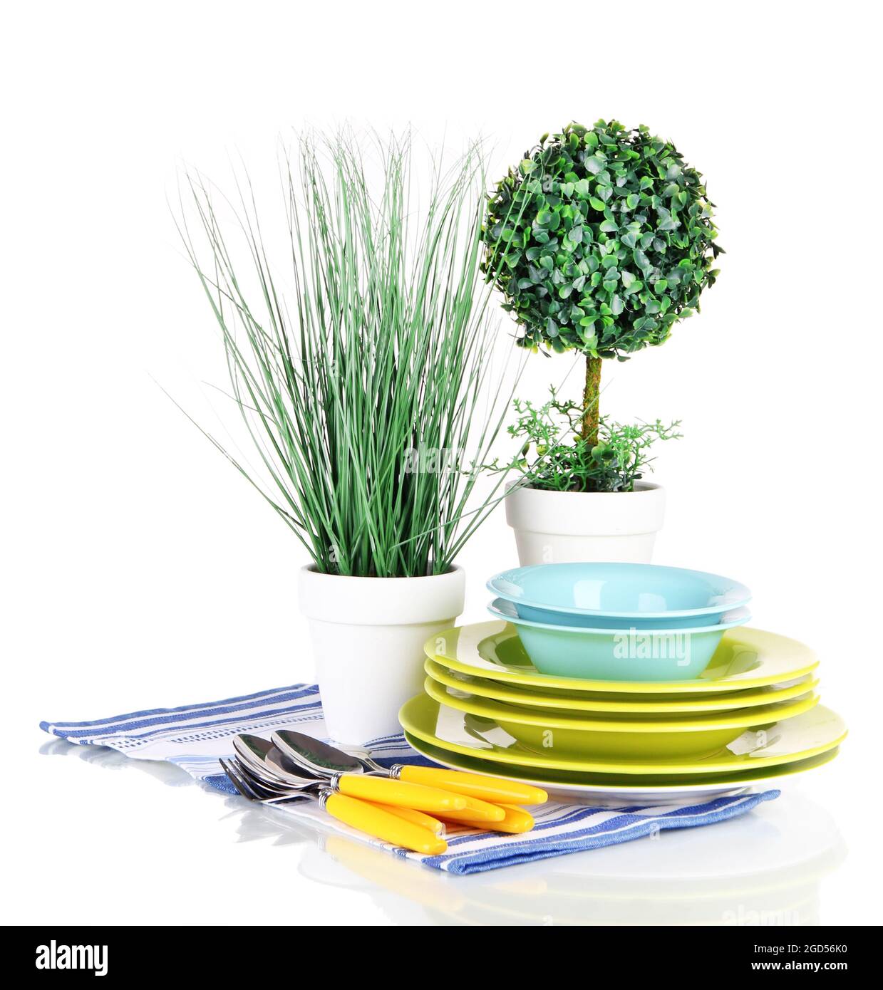 Clean dishes with flowers isolated on white Stock Photo - Alamy