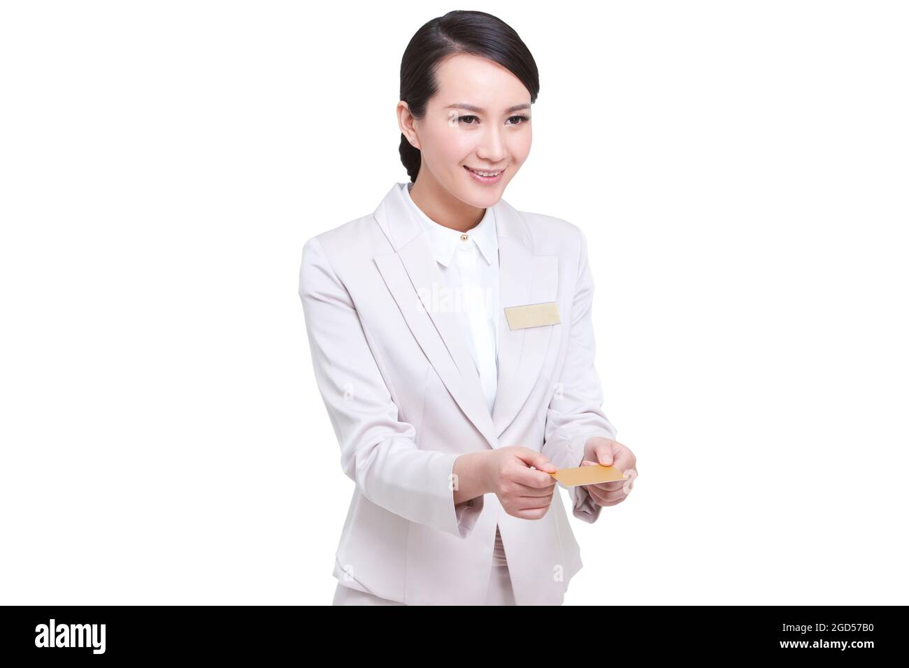 Businesswoman handing bank card out Stock Photo - Alamy
