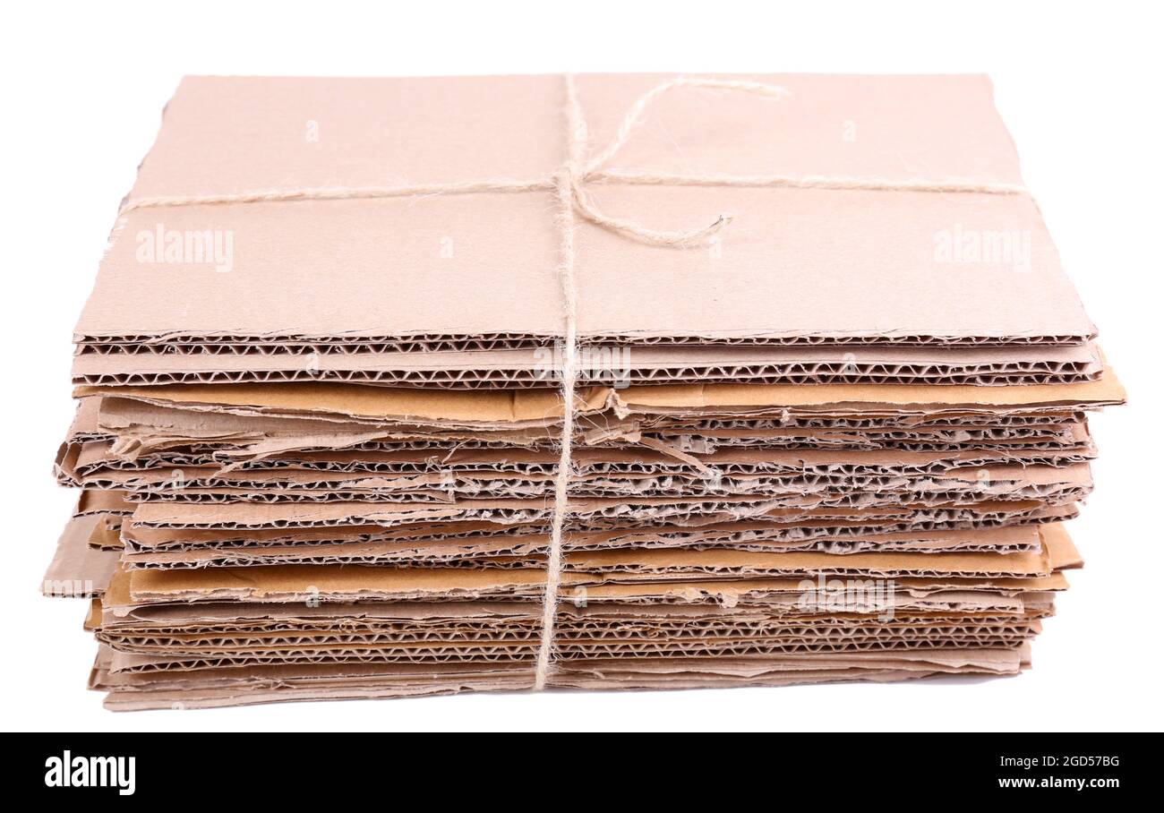 Stack of cardboard for recycling isolated on white Stock Photo - Alamy