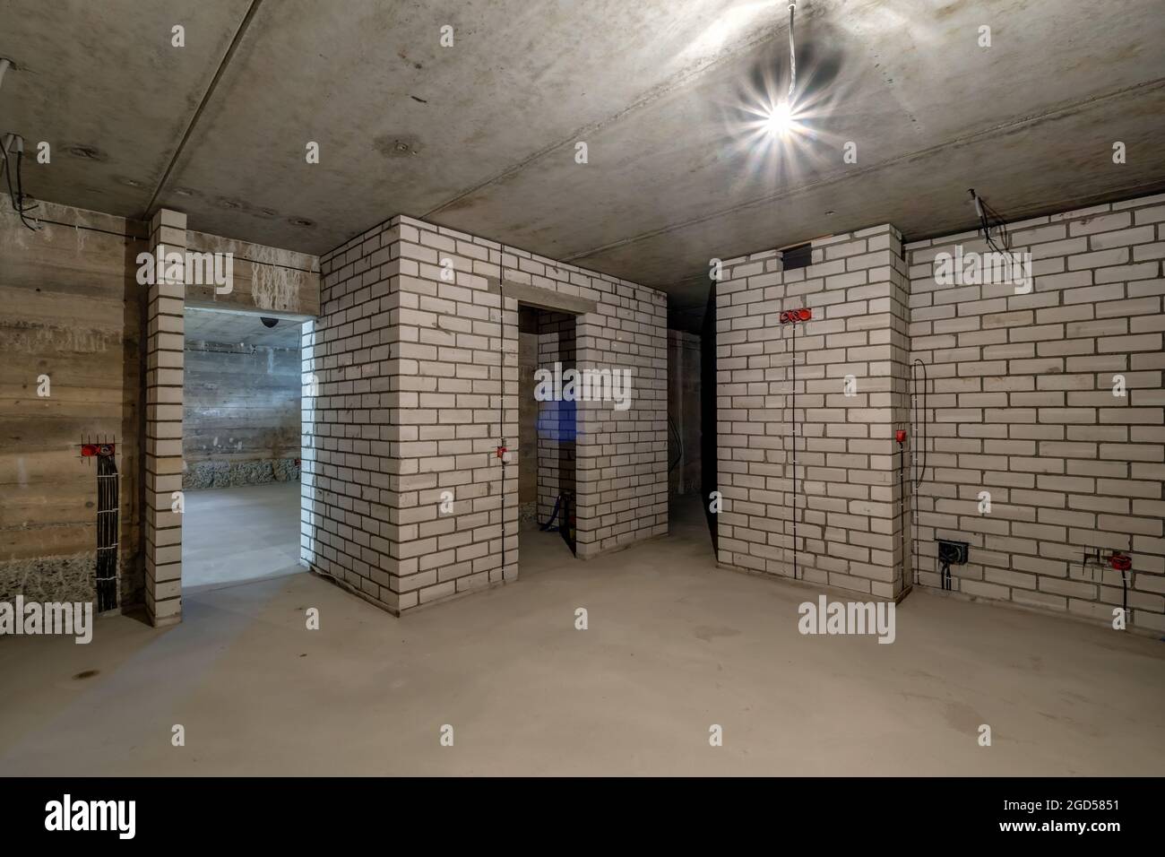 Empty basement room with minimal preparatory repairs. interior with ...