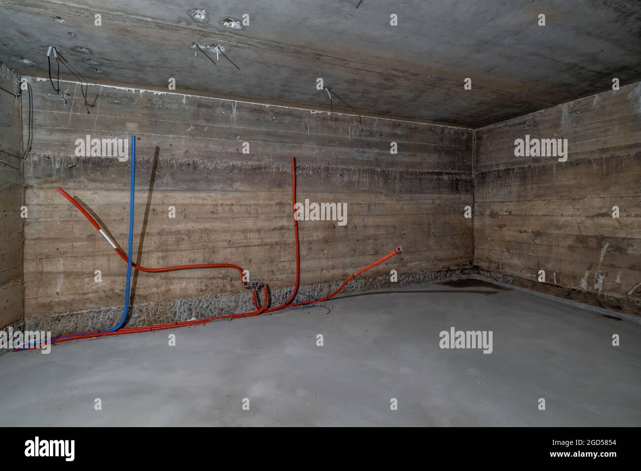 Empty basement room with minimal preparatory repairs. interior with ...