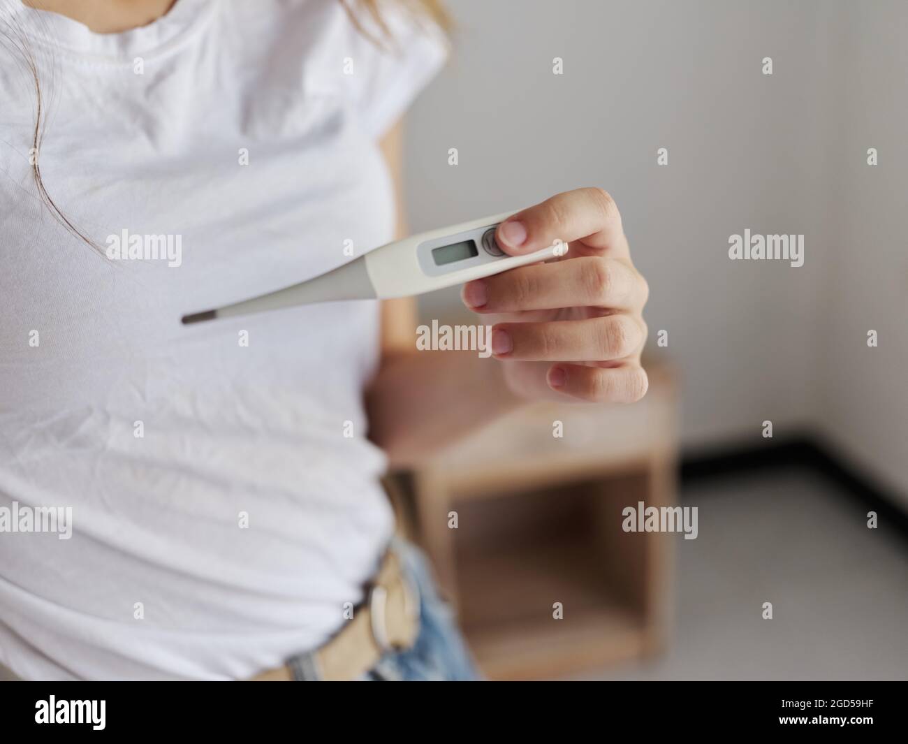woman with thermometer checking temperature cropped view Stock Photo ...