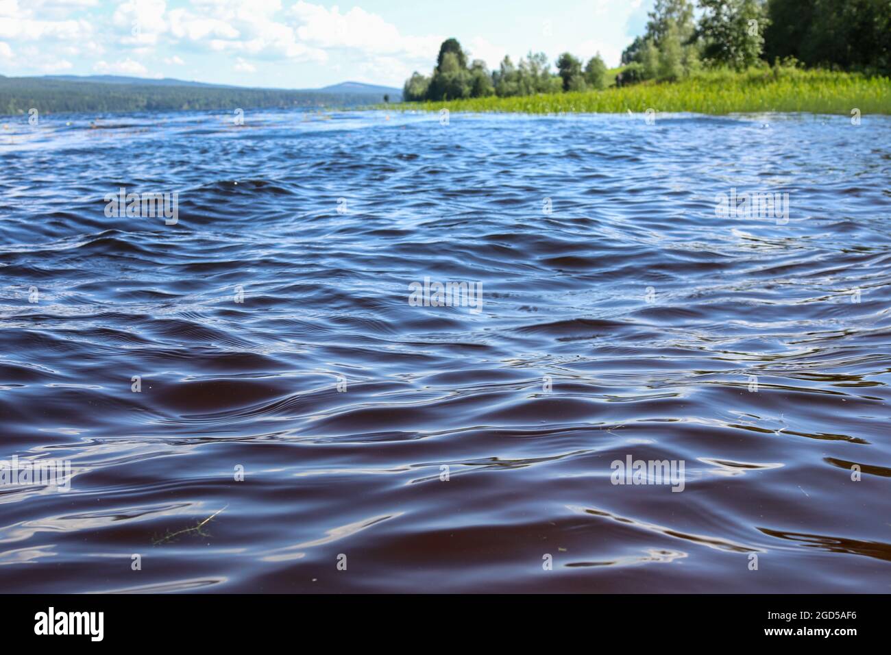 Water ripples in a lake Stock Photo - Alamy