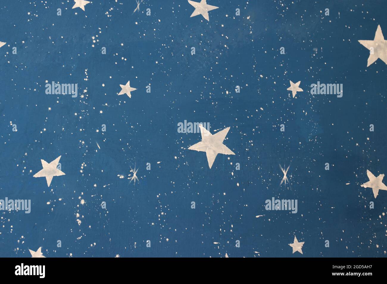 Blue painted wall with white star Stock Photo - Alamy