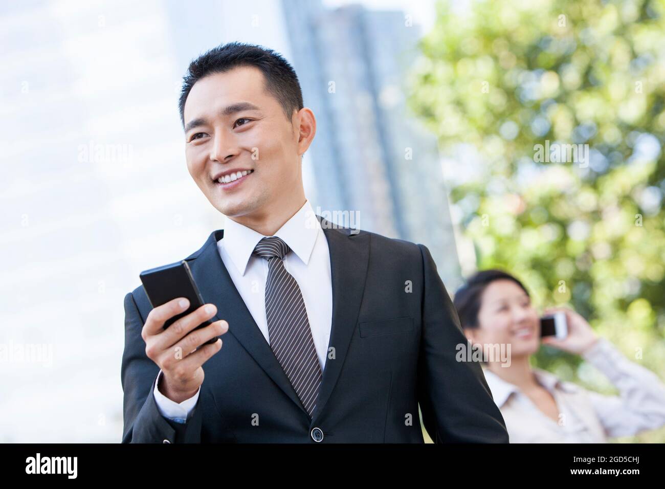Office workers with smart phones Stock Photo - Alamy