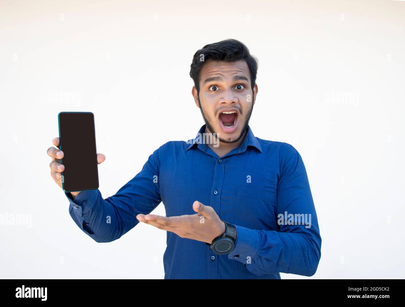 Excited male standing mobile phone hi-res stock photography and images ...