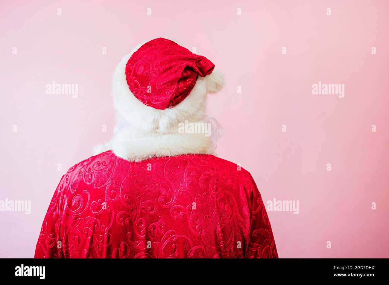 Man dressed as Santa Claus turned around showing his back Stock Photo ...