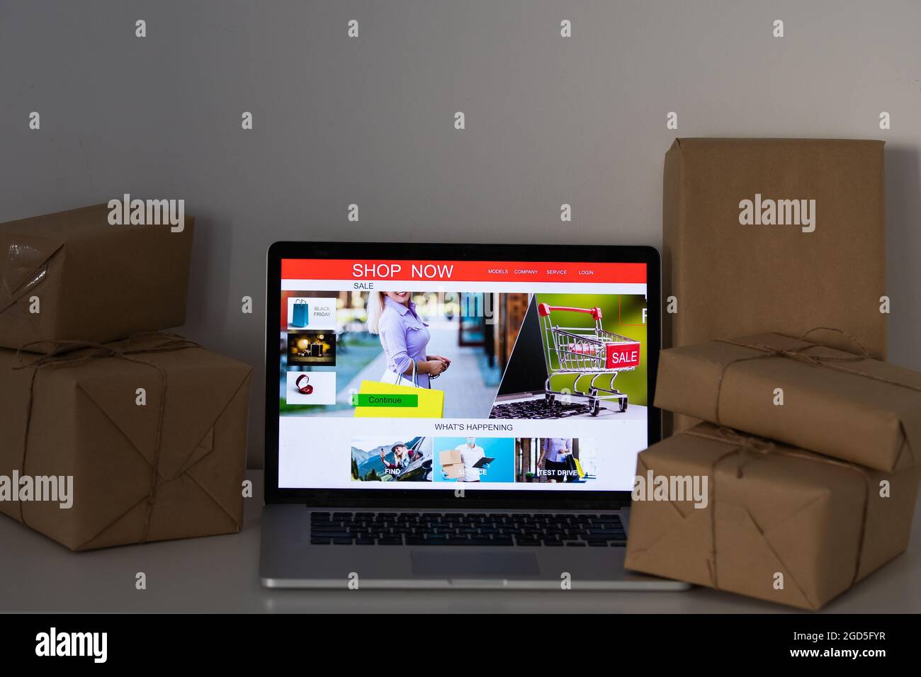 Online shopping - Paper cartons or parcel on a laptop keyboard ...