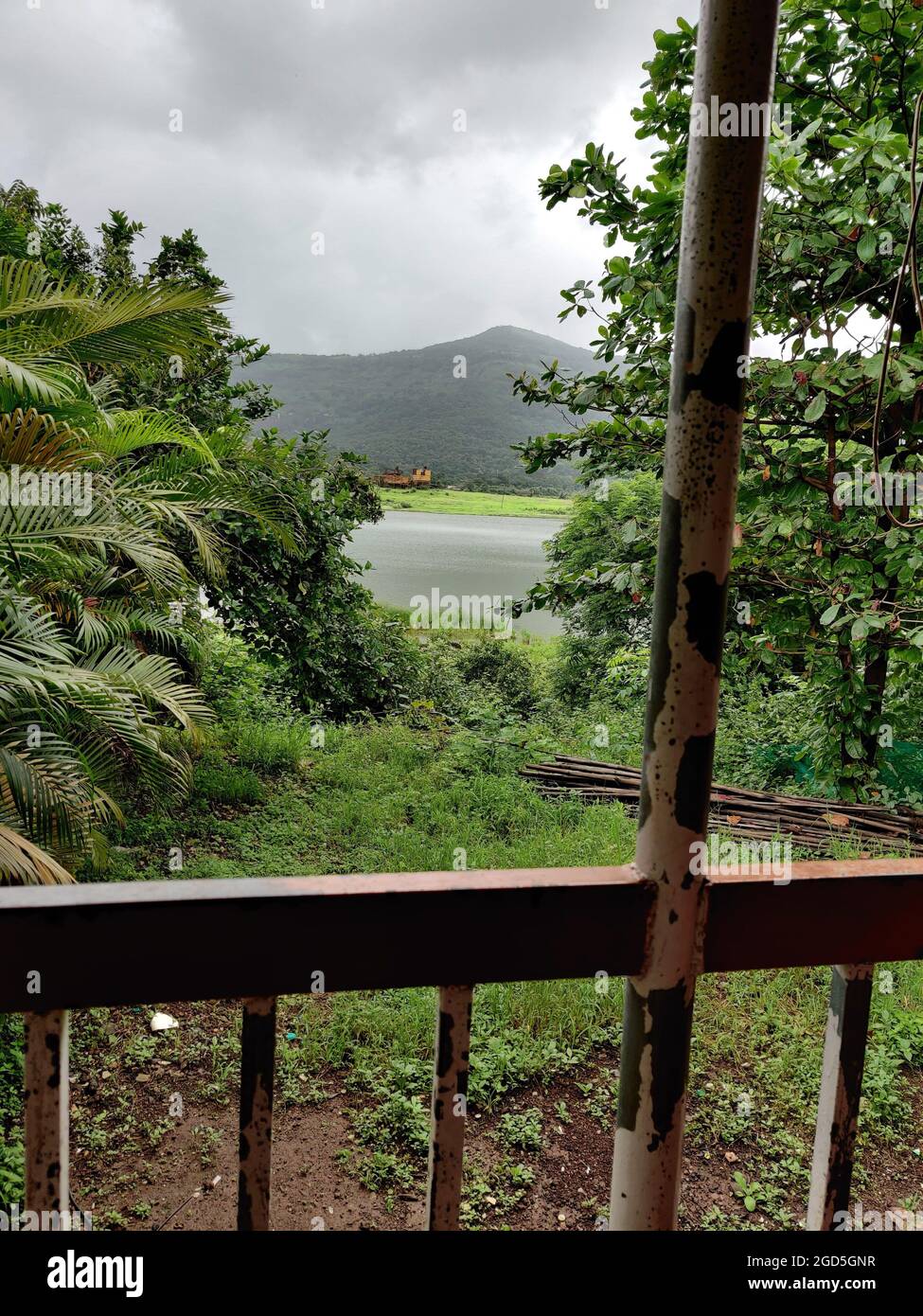 Khopoli Dam with trees cloudy climate Stock Photo - Alamy