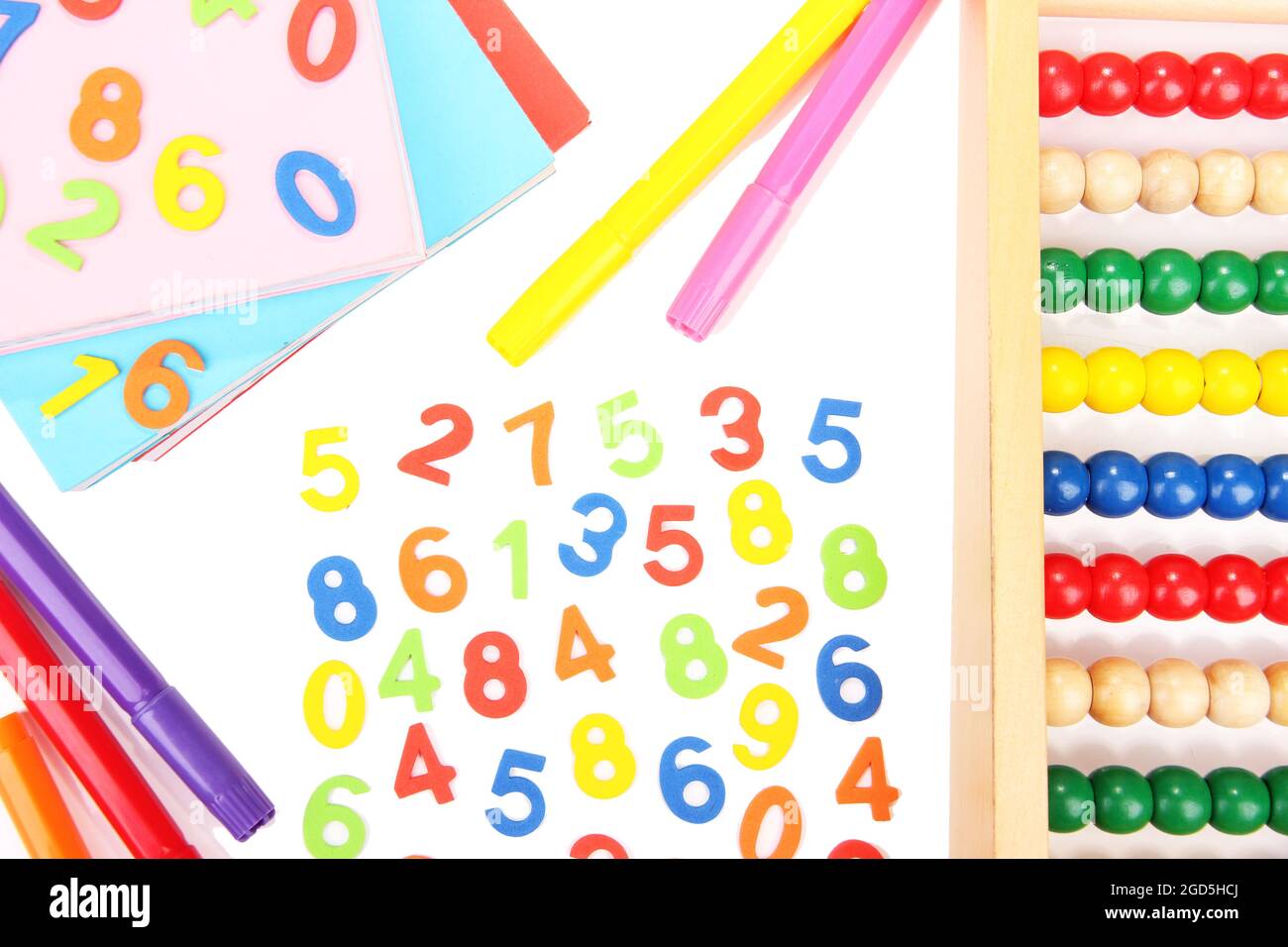 Colorful numbers, abacus, books and markers, isolated on white Stock ...