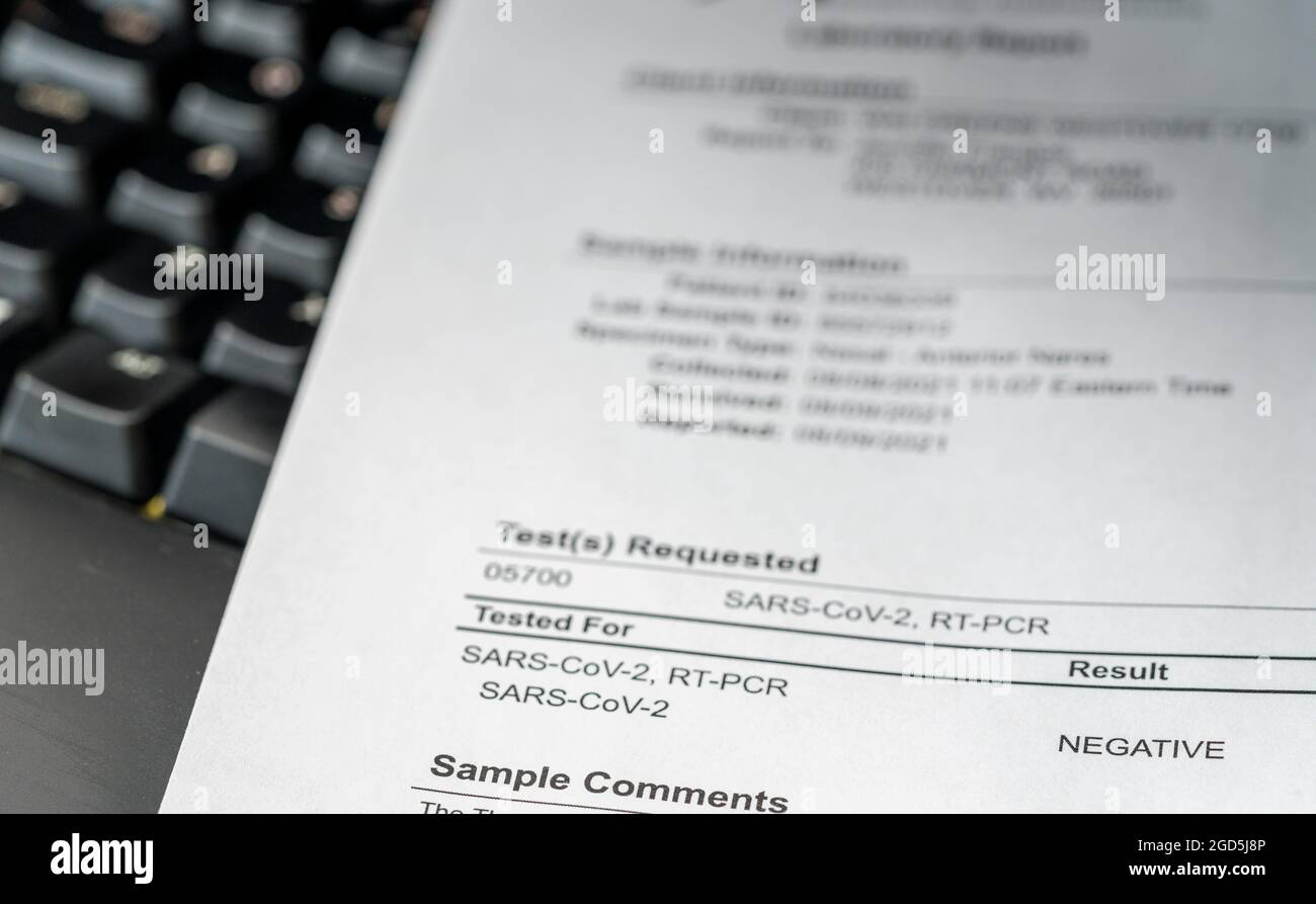 Paper printout showing a negative result for PCR test on nasal swab for ...