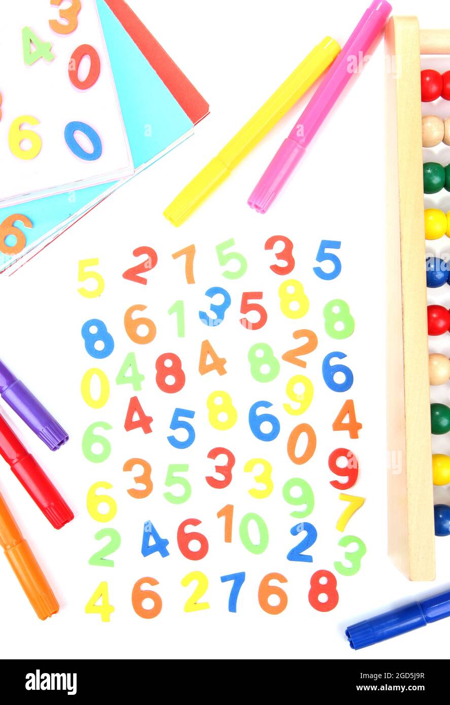 Colorful numbers, abacus, books and markers, isolated on white Stock ...