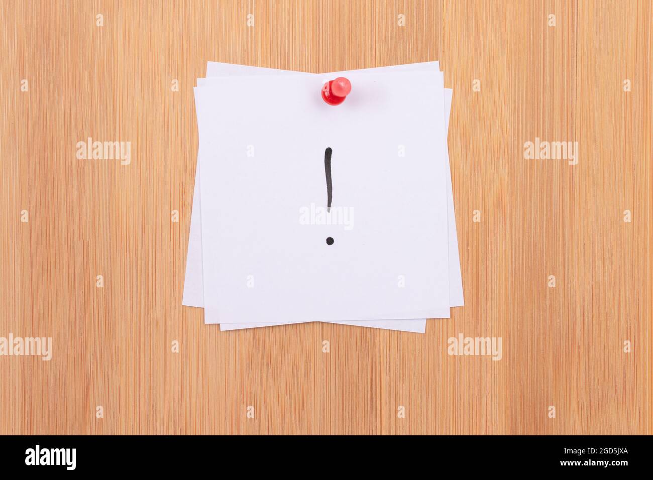 White Sticky Notes with Exclamation Point Pinned to the Wooden Message ...